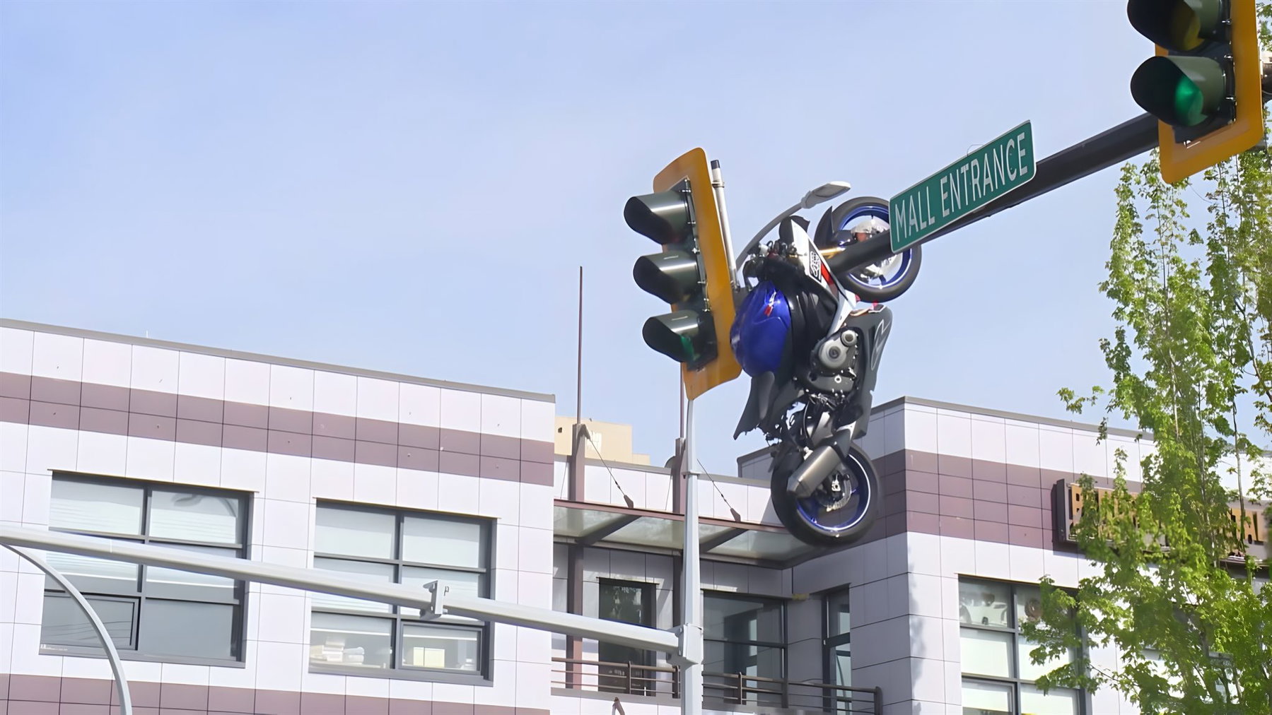 Motorcycle Crash in Delta, Canada: Bike Ends Up Hanging from Traffic Light